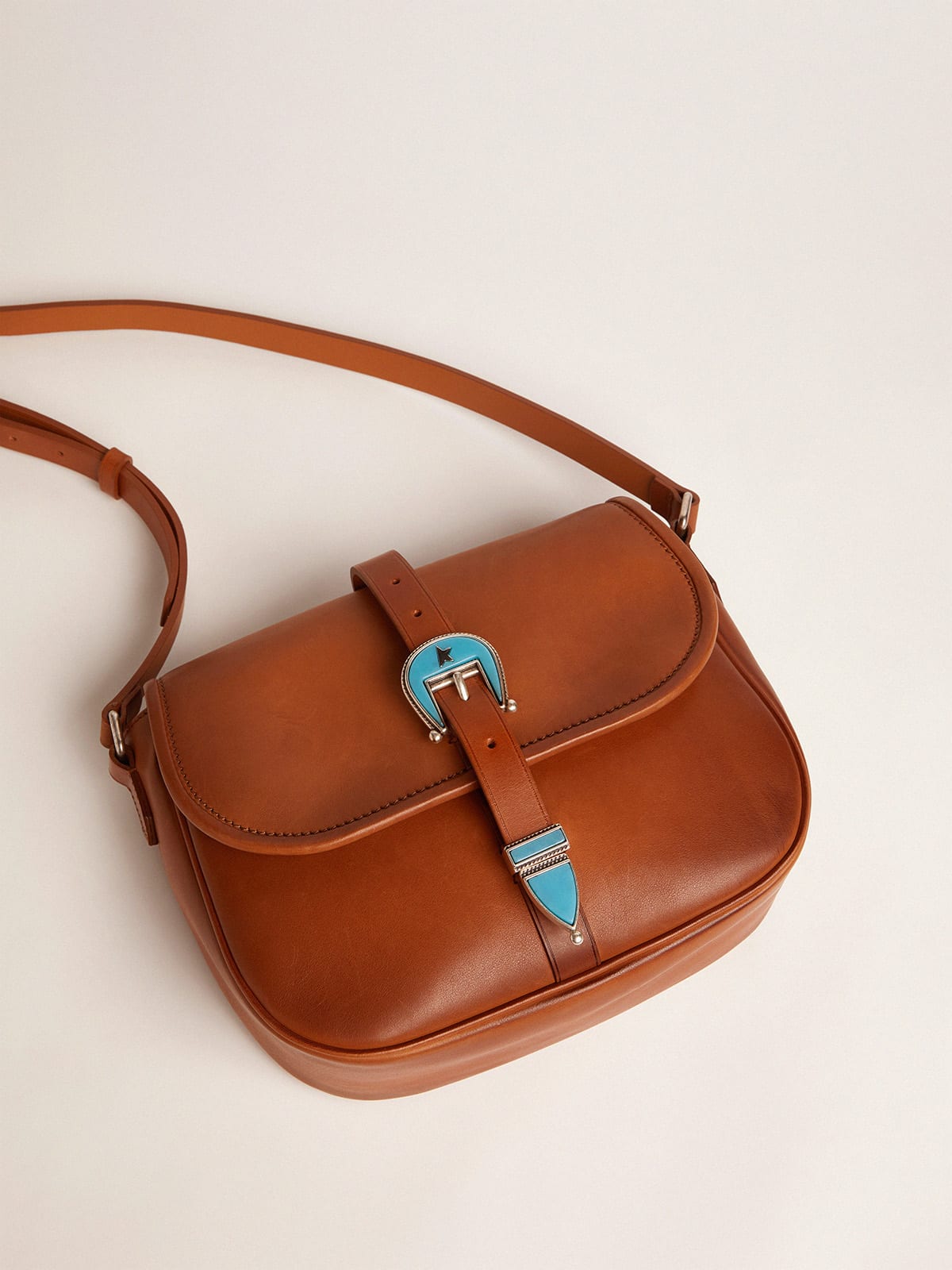 Medium Rodeo Bag in tan-colored leather with light blue details ...