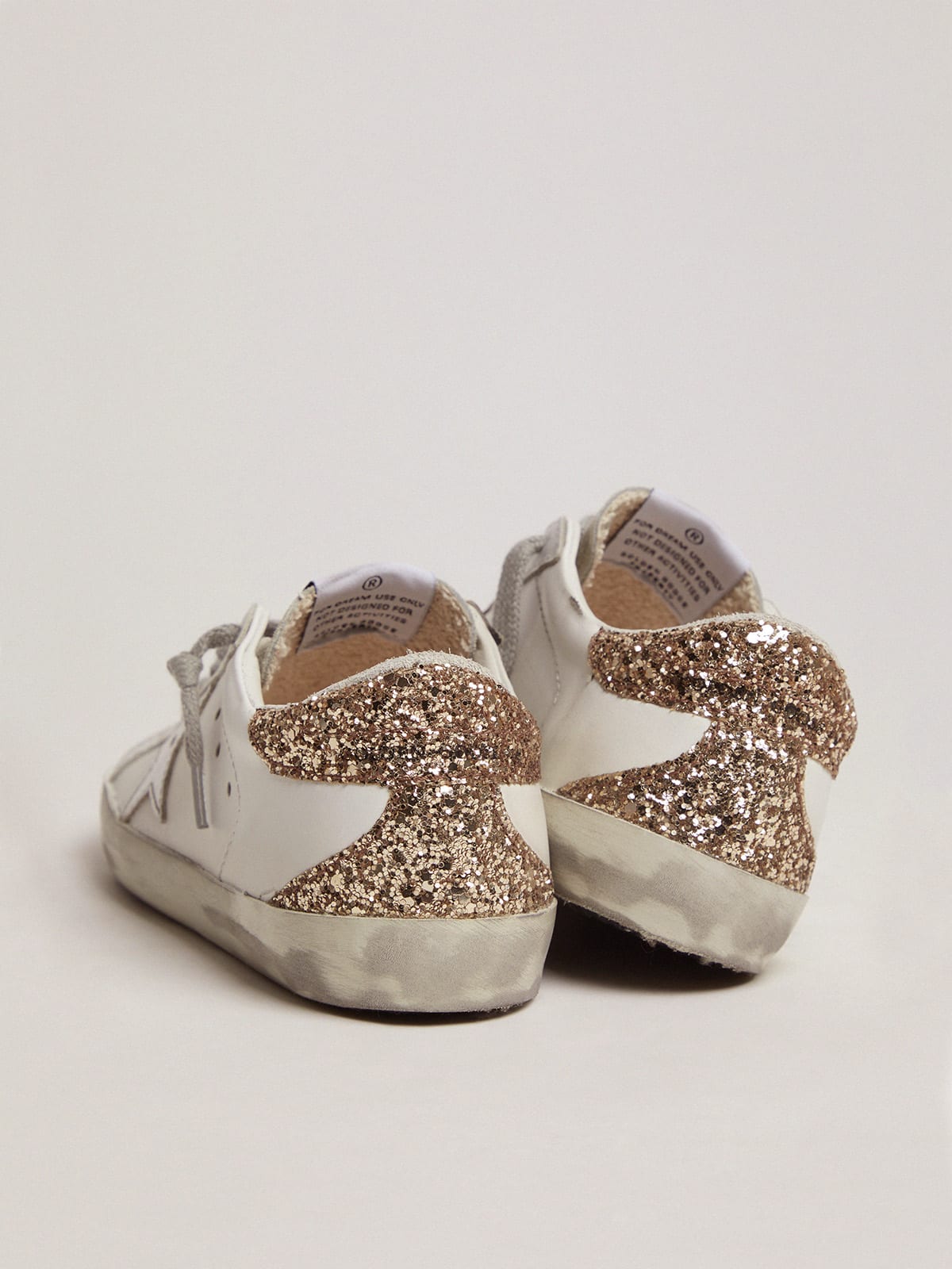 Young Super-Star sneakers with gold glitter heel tab and silver star ...