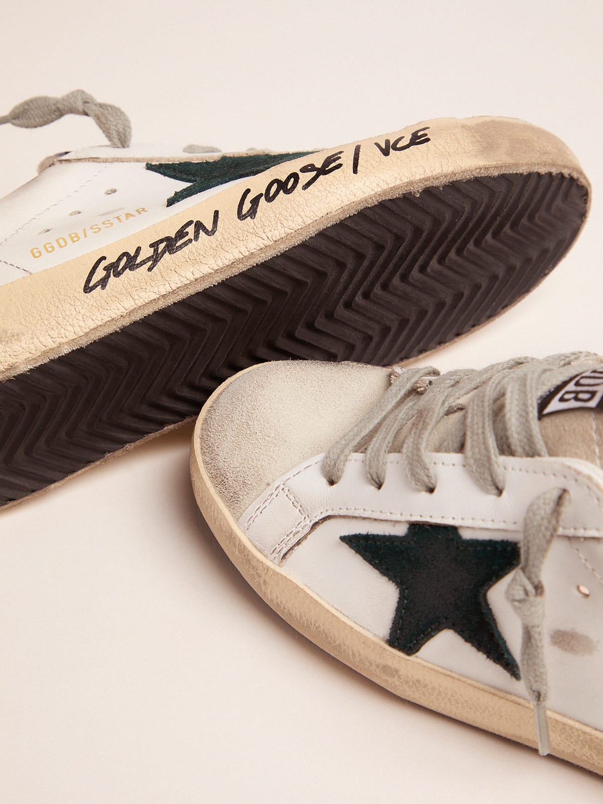 Young Super-Star sneakers with gold heel tab and handwritten lettering ...
