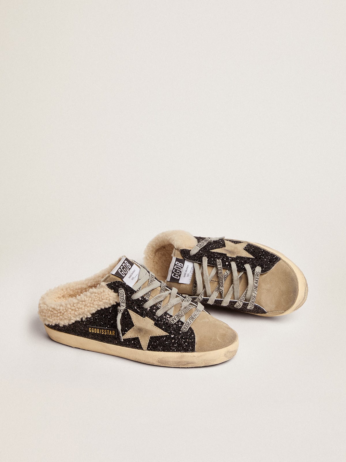 Mules Super-Star LTD con purpurina negra, estrella de ante color gris ...