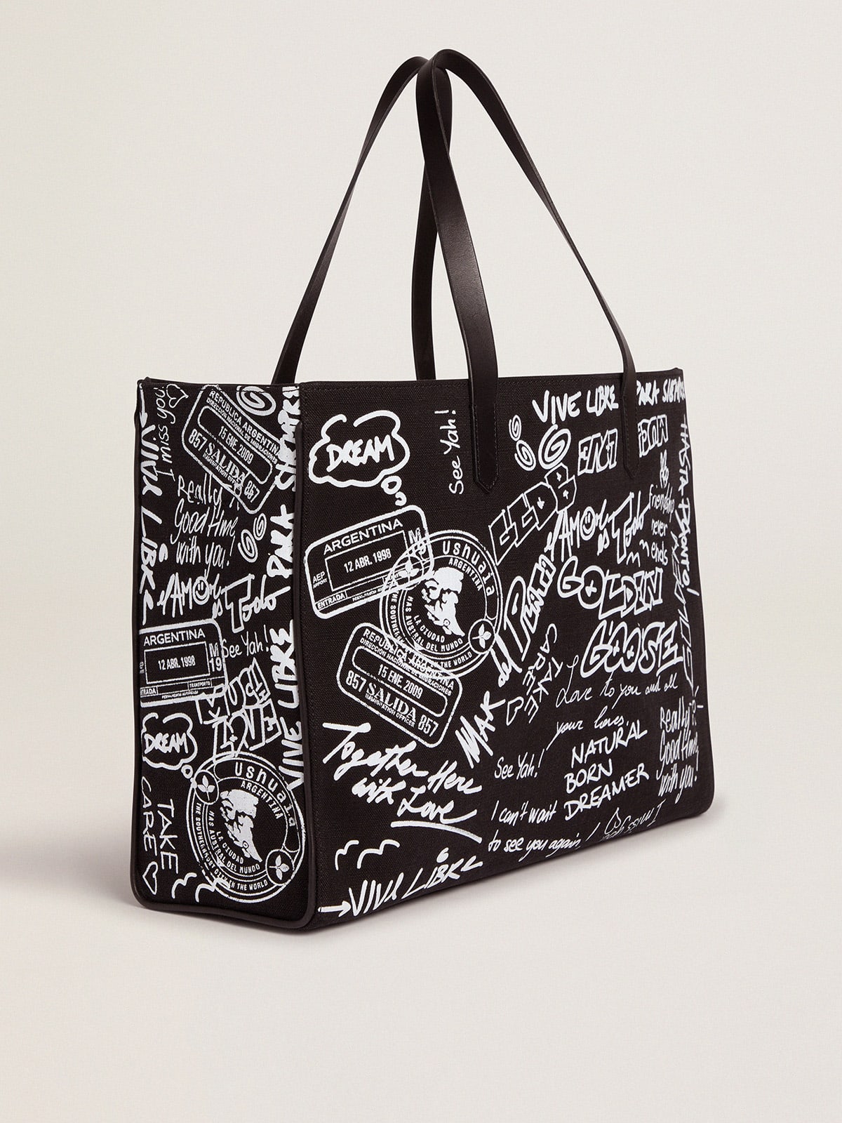Black East-West California Bag with contrasting white graffiti print ...