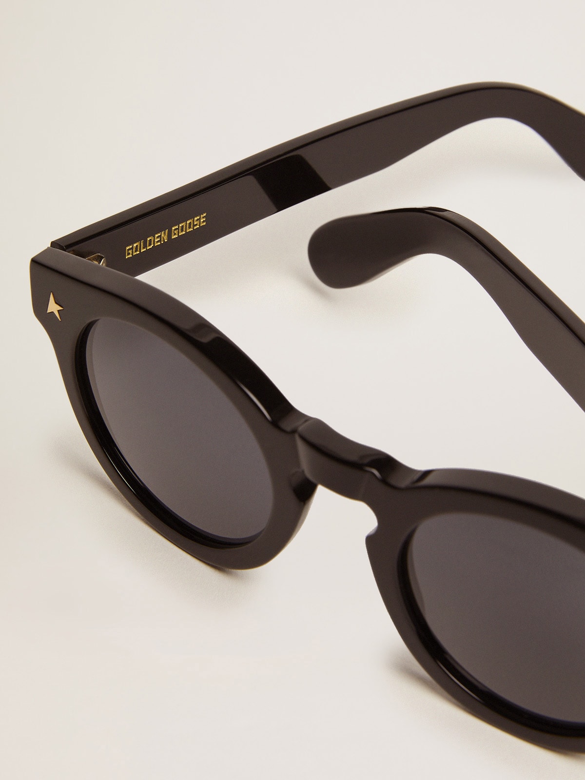 Sunframe Panthos model with black frame and gold details | Golden Goose