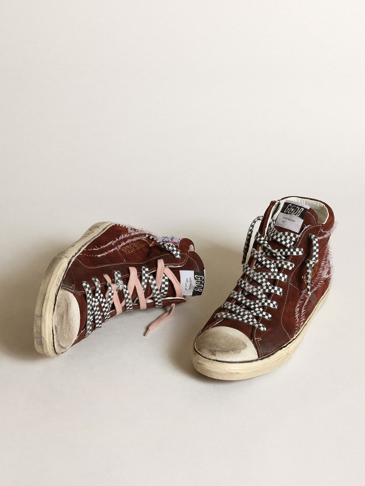 Slide sneakers in chocolate-colored suede with white stitching on the ...