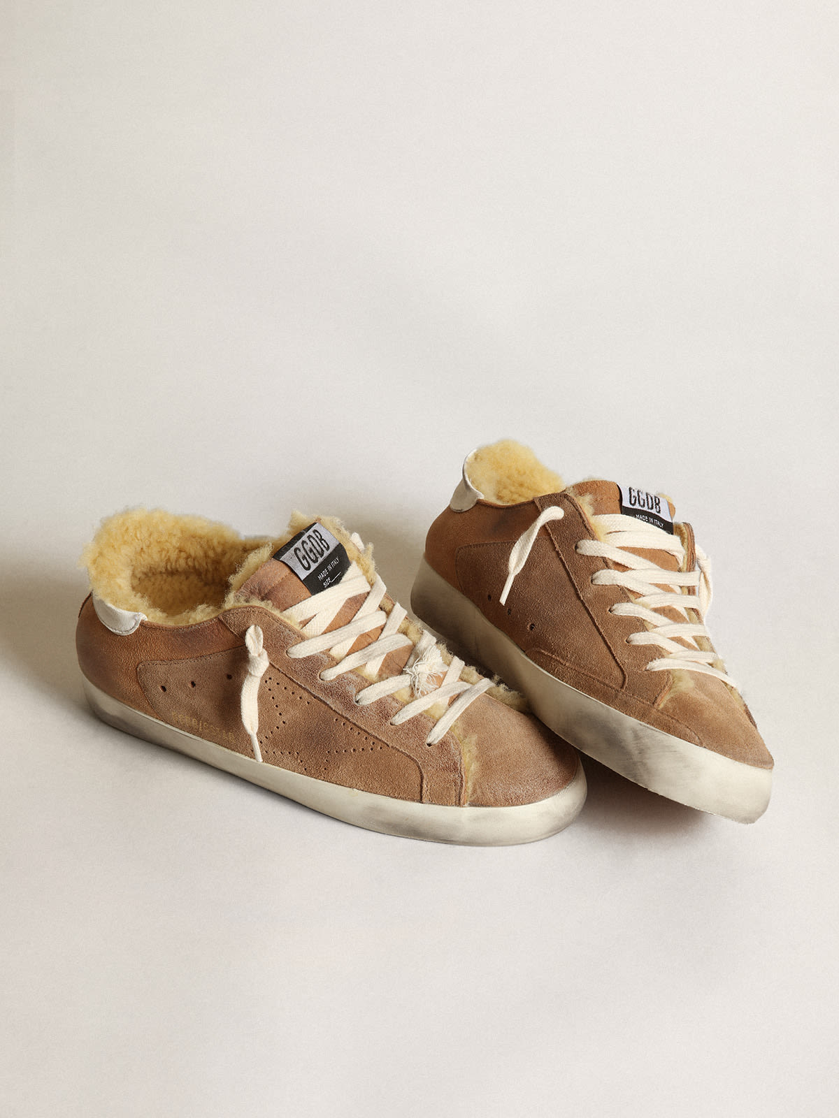 Super-Star LTD with a perforated star and shearling lining | Golden Goose