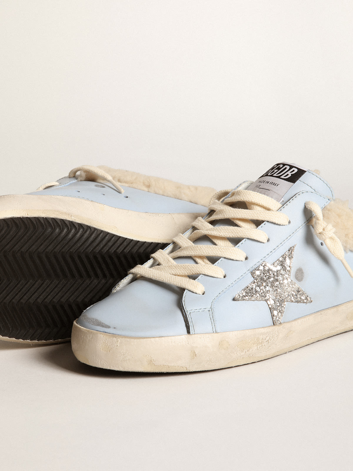 Super-Star Sabots in powder-blue leather with silver glitter star and ...
