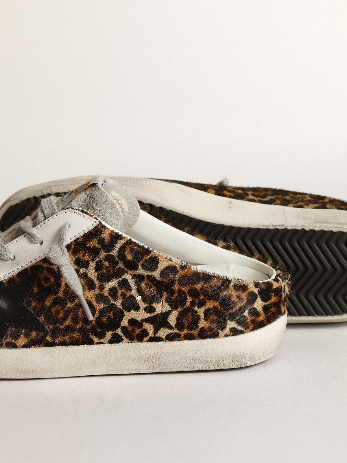 Super-Star Sabots in leopard-print pony skin with black leather star ...