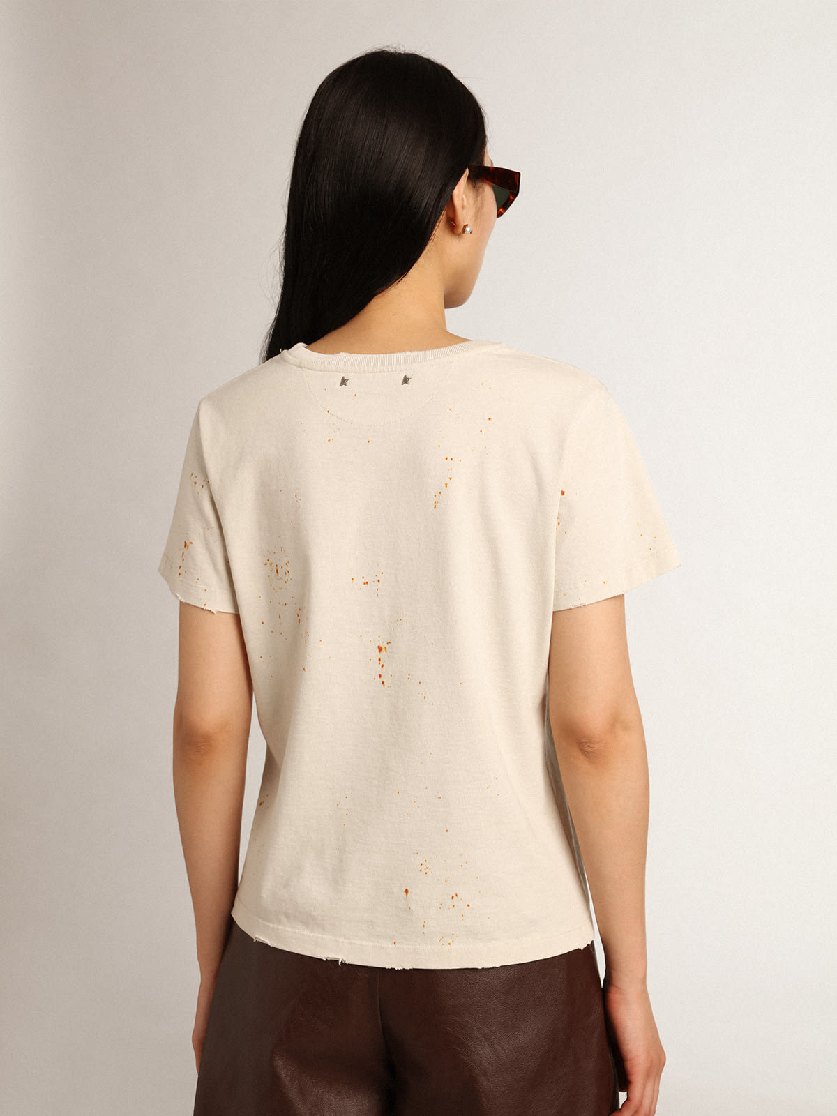 Bone-white Journey Collection T-shirt with Golden lettering and rust ...