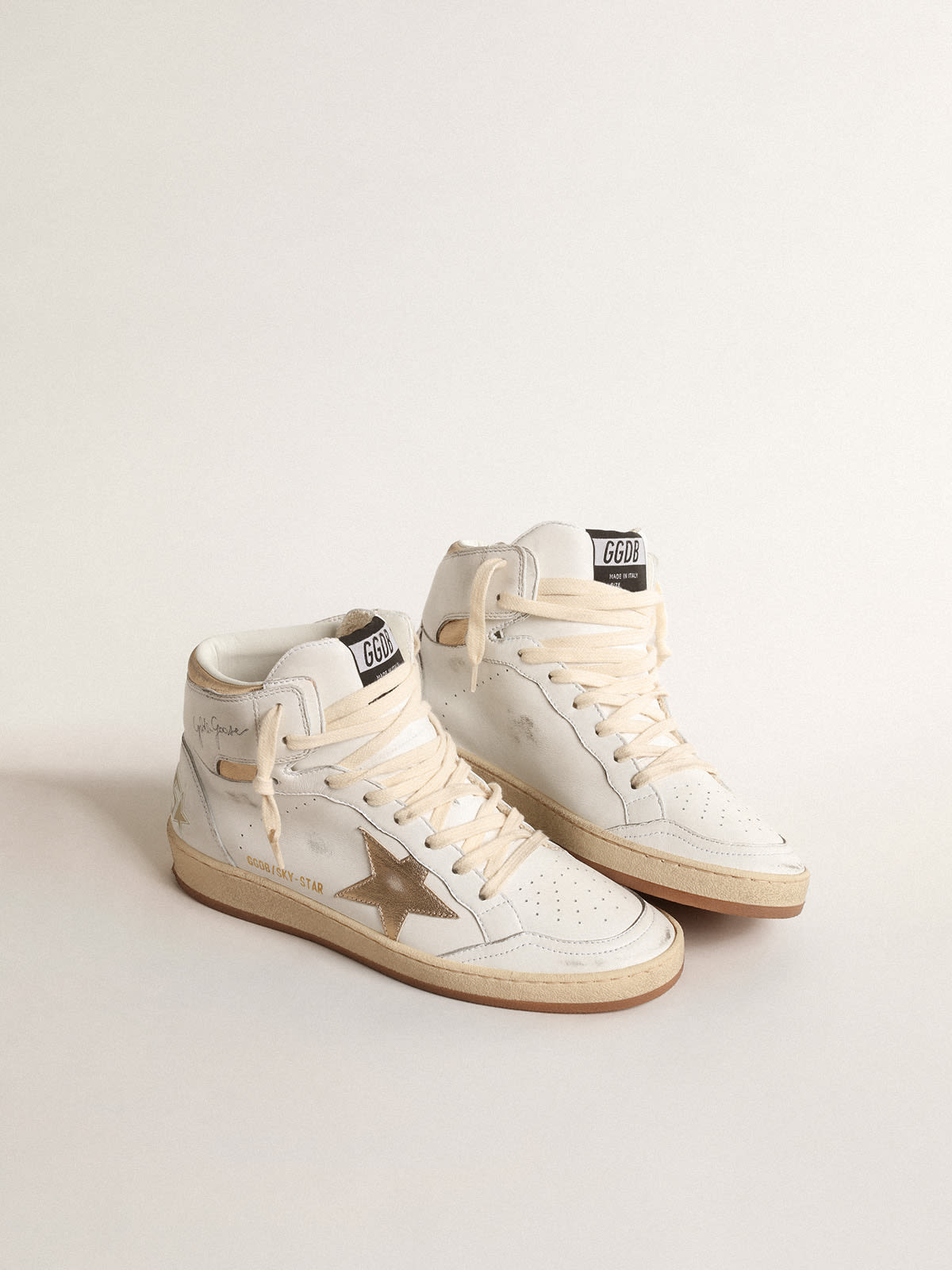 Sky-Star in white nappa leather with gold metallic leather star and ...